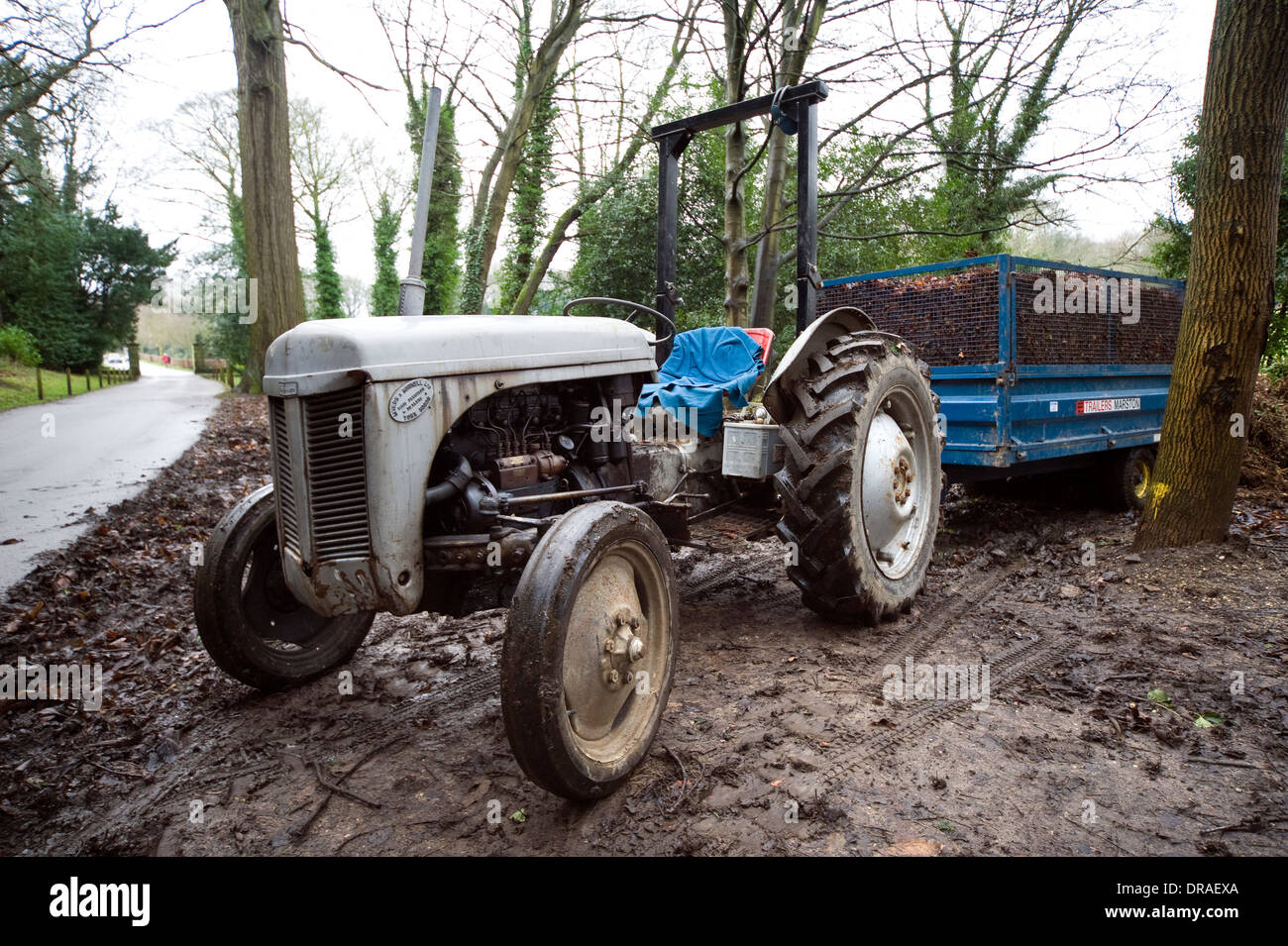 Old tractor, with a trailer full of leaves Stock Photo - Alamy