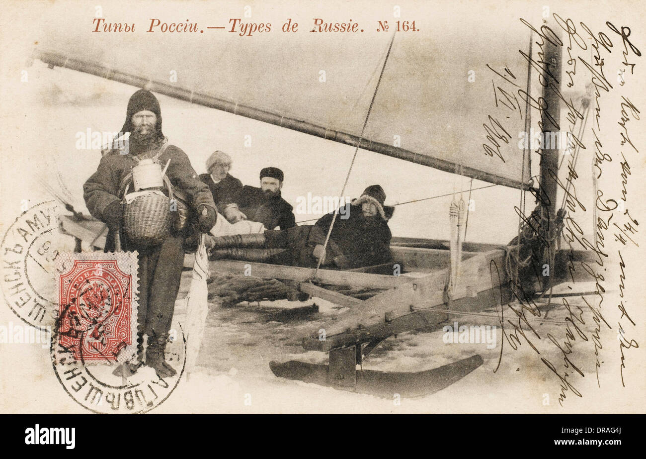 Russian men on a snow raft Stock Photo - Alamy