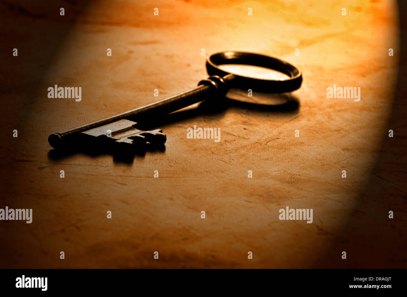 Old key laying on top of worn wood Stock Photo - Alamy