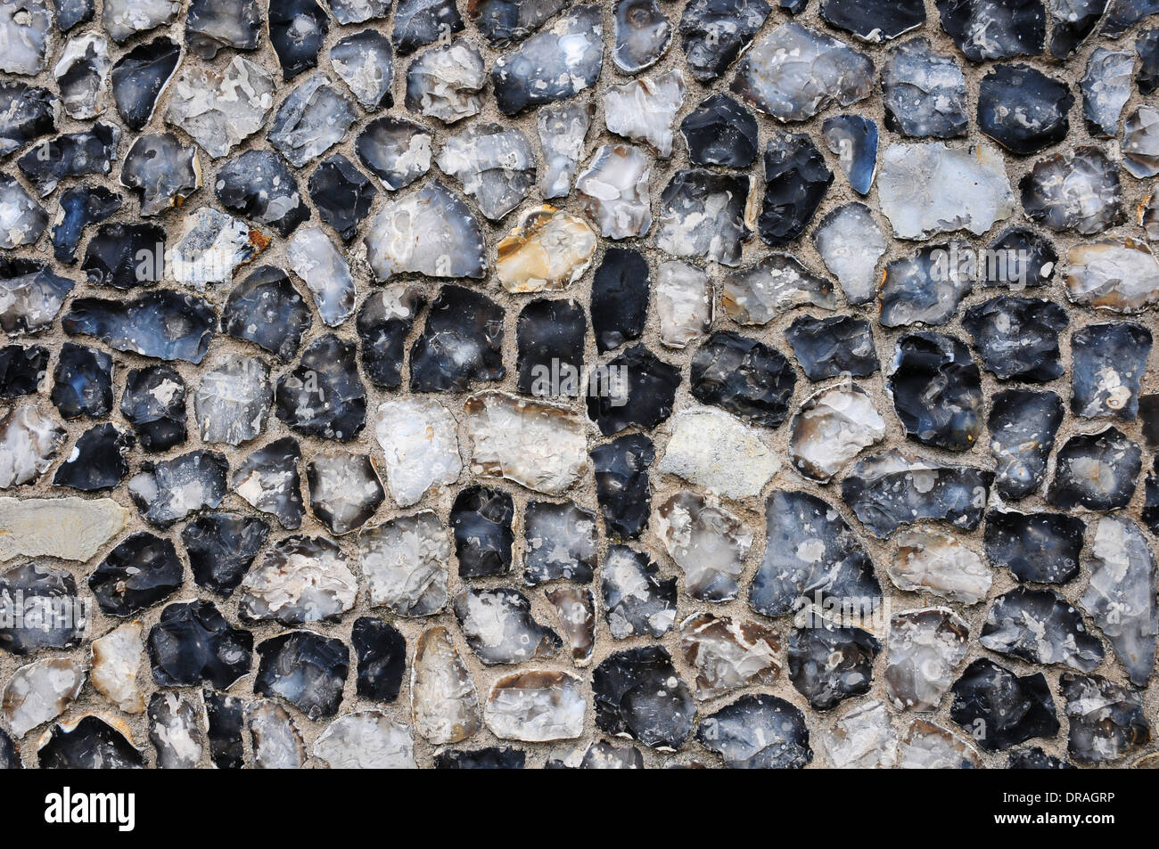 Decorative knapped flintwork in a wall, Norwich Stock Photo - Alamy