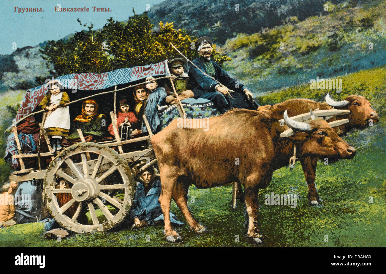 Georgian family in (and around) their ox cart Stock Photo - Alamy