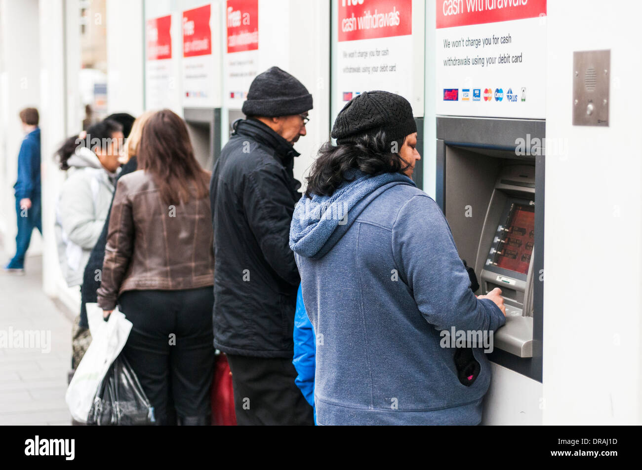 Woman man cash britain hi-res stock photography and images - Alamy