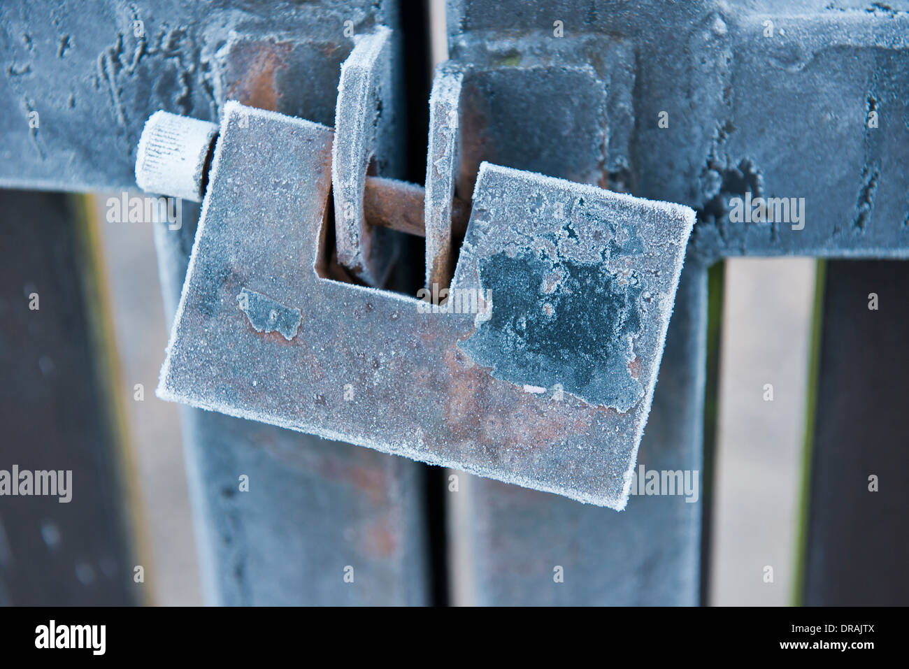 old, frozen padlock - closeup of a closed padlock Stock Photo - Alamy