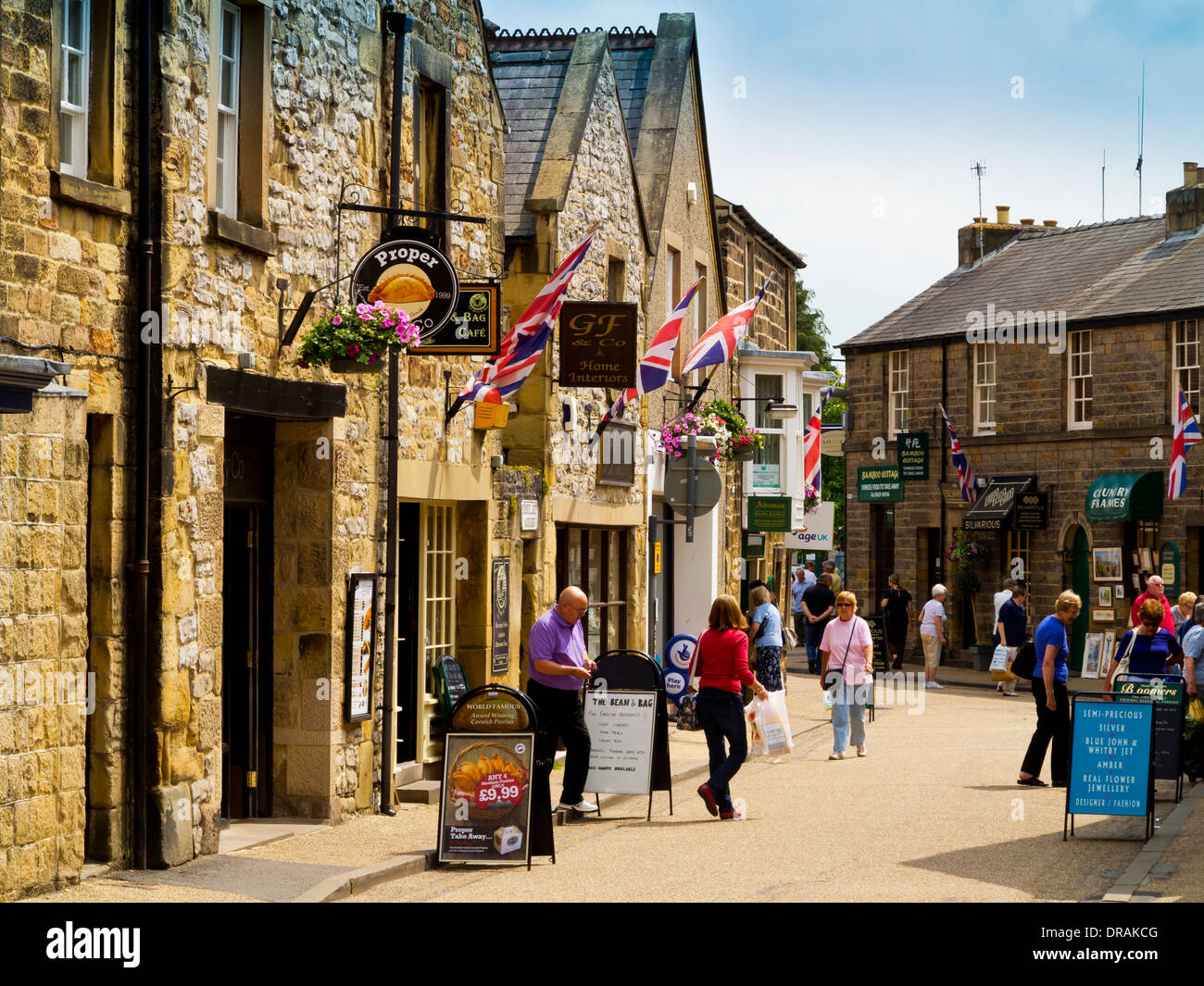 Tourists looking at shops in Bakewell town centre a popular destination ...