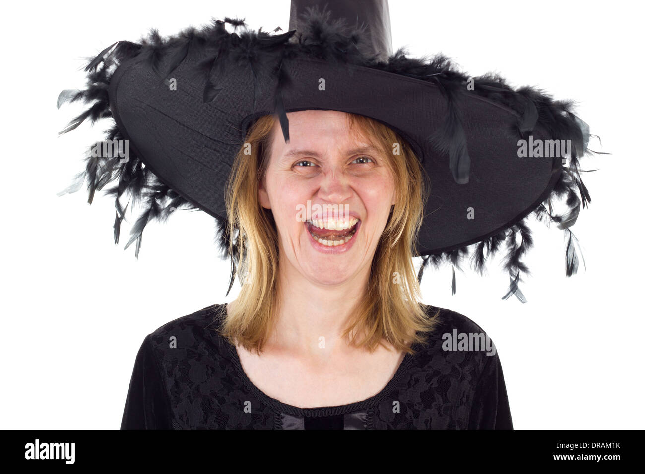 Hag in Middle Ages with evil laughing Stock Photo - Alamy