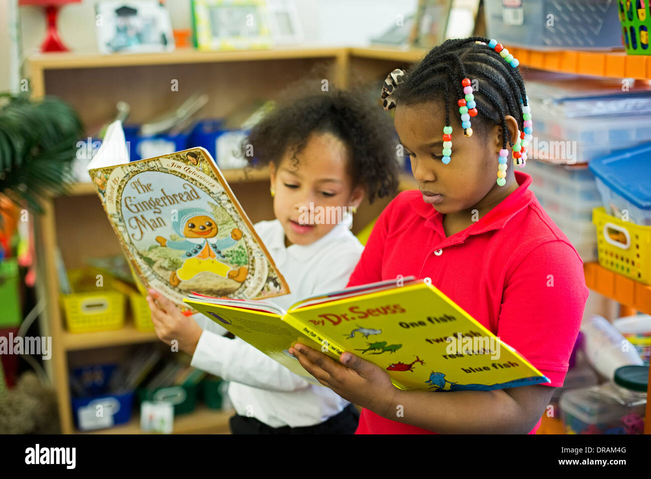First grade student reading book hi-res stock photography and images ...