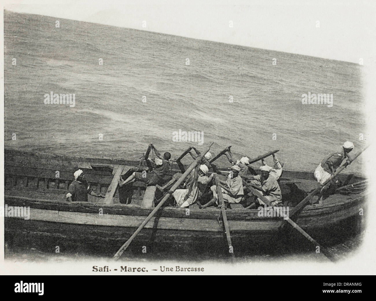 Native Rowing barge and Oarsmen - Morocco Stock Photo - Alamy