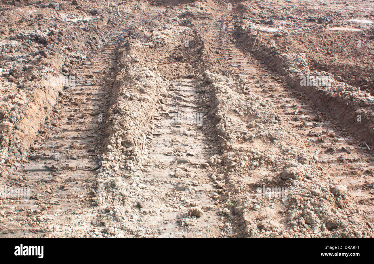 Tractor tracks on the ground made the road conditions Stock Photo - Alamy