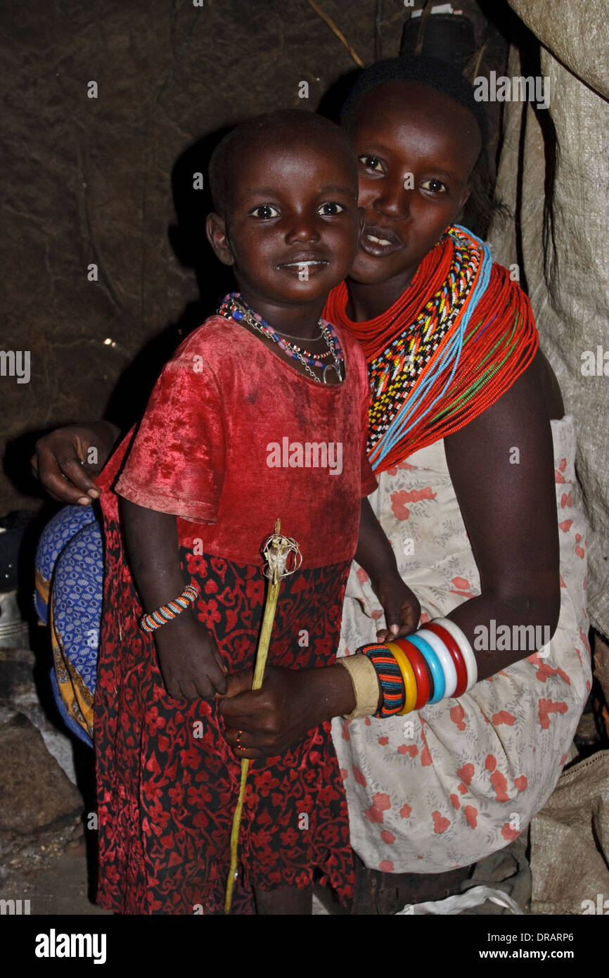 Mother with her child from the Samburu tribe in a hut in the Samburu ...