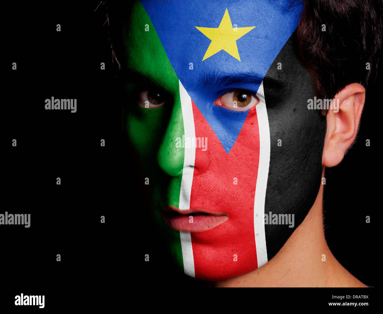Flag of South Sudan Painted on a Face of a Young Man Stock Photo - Alamy
