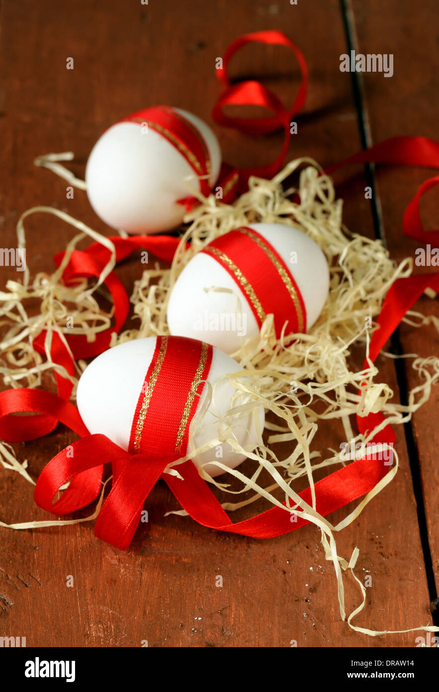 festive eggs decorated with red ribbon - symbol of Easter holiday Stock ...