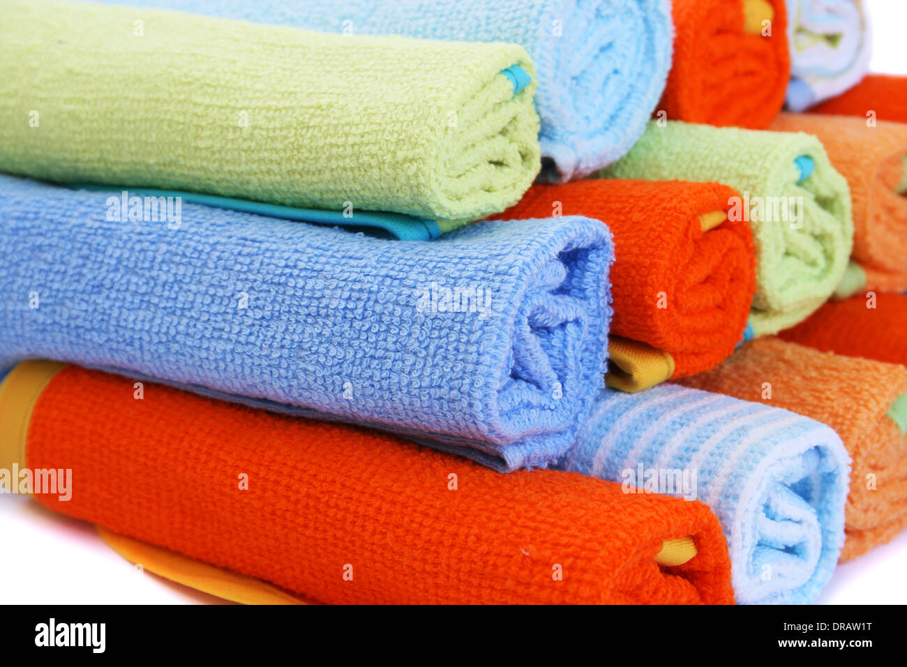 Colorful towels on white background Stock Photo - Alamy