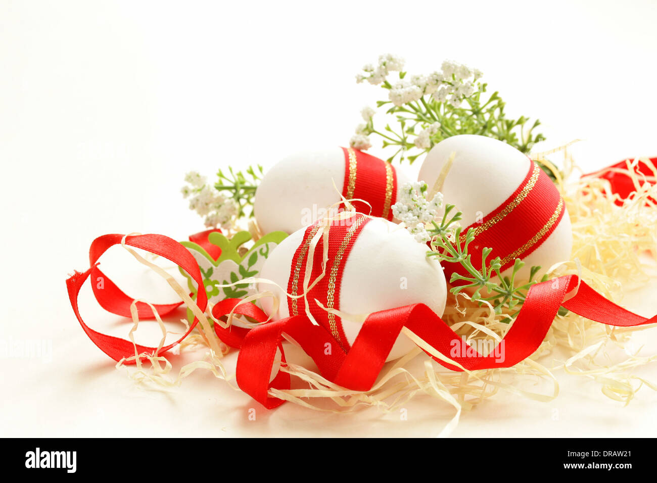 festive eggs decorated with red ribbon - symbol of Easter holiday Stock ...