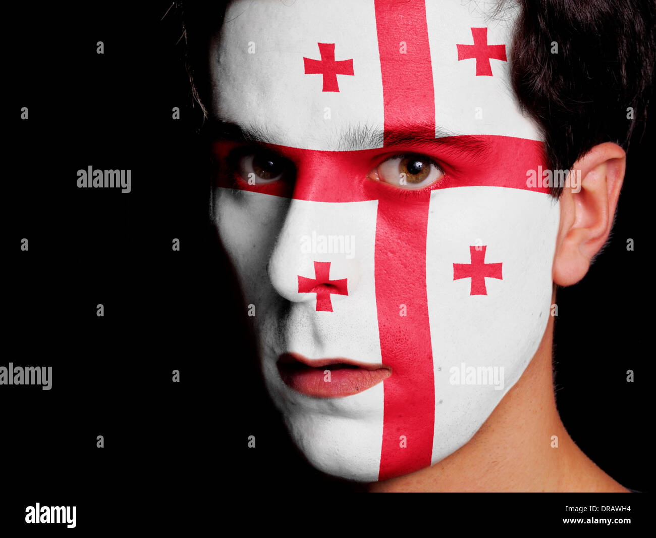 Flag of Georgia Painted on a Face of a Young Man Stock Photo - Alamy