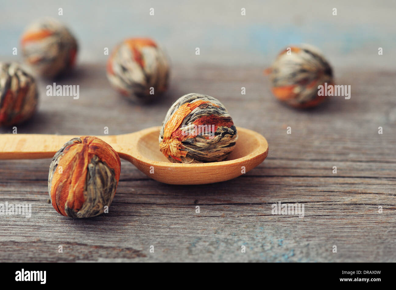 Chinese Green Tea Balls with Lychee Flower on wooden background Stock ...