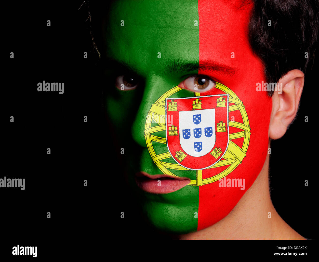 Flag of Portugal Painted on a Face of a Young Man Stock Photo - Alamy