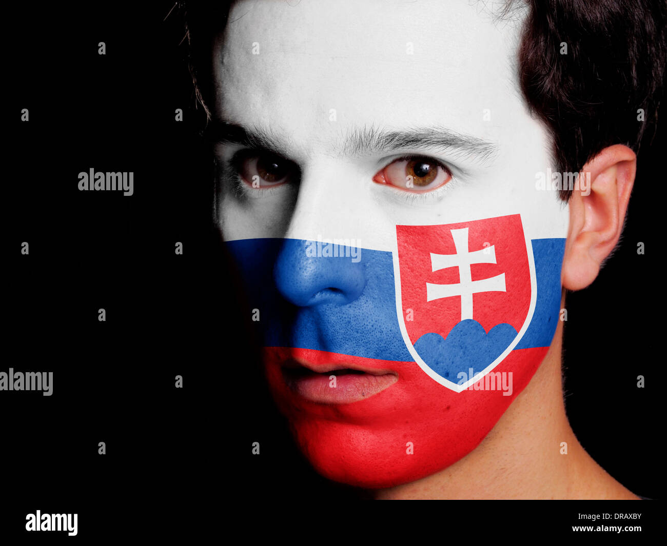 Flag of Slovakia Painted on a Face of a Young Man Stock Photo - Alamy