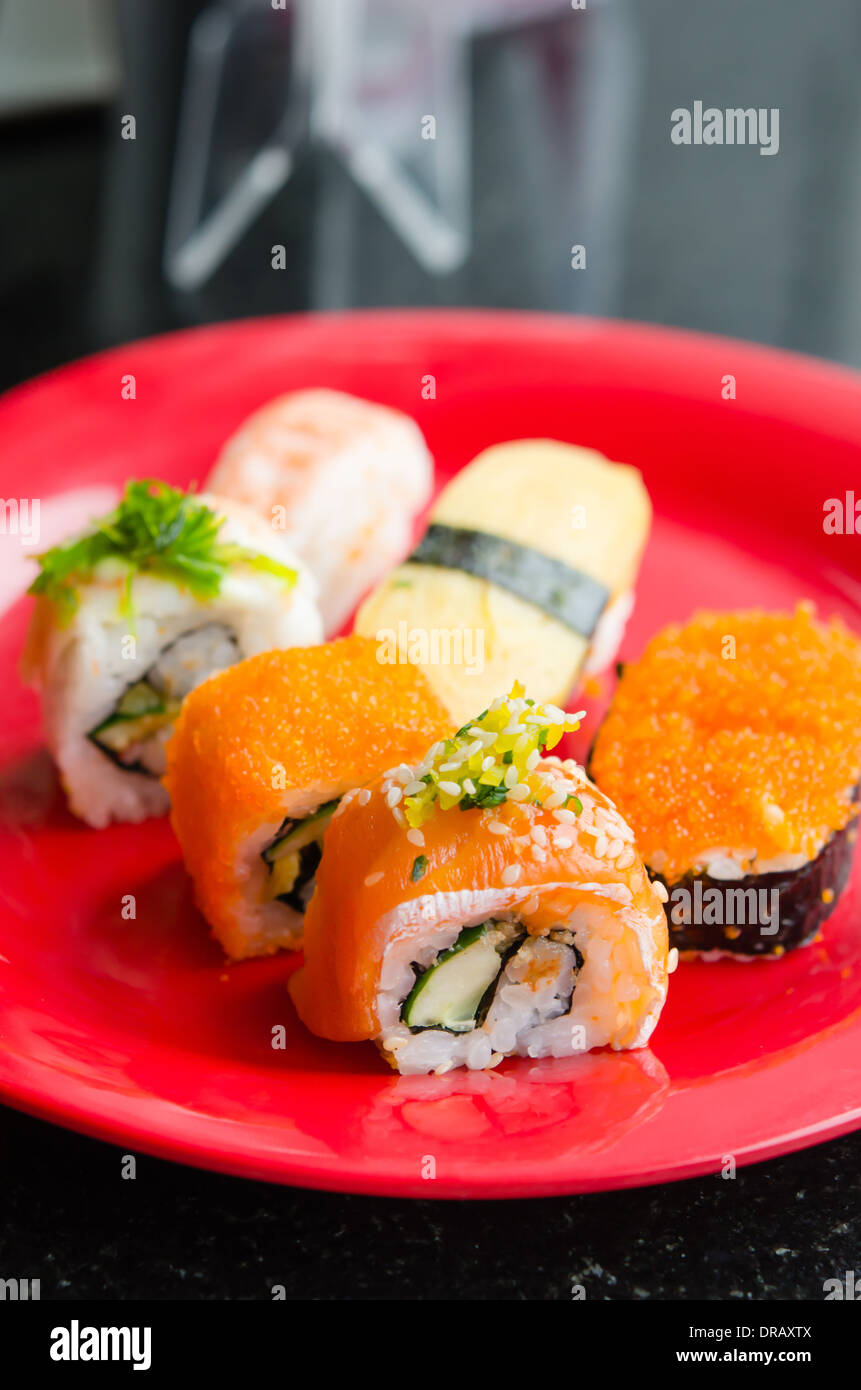 Mixed sushi set on a red plate , favorite japanese food Stock Photo - Alamy