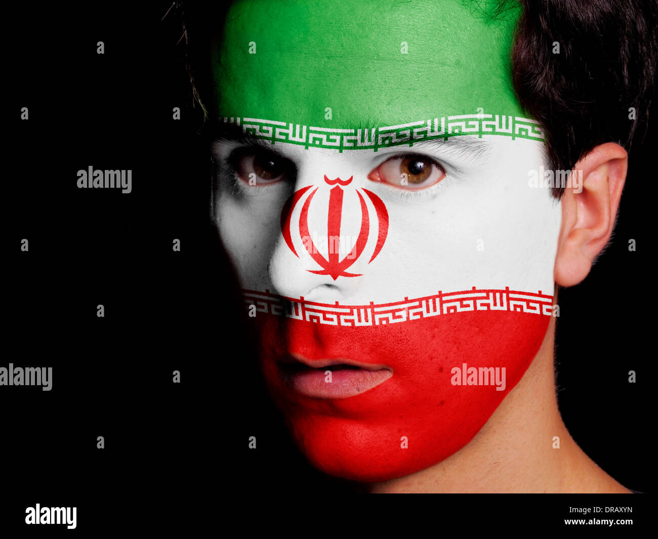 Flag of Iran Painted on a Face of a Young Man Stock Photo - Alamy