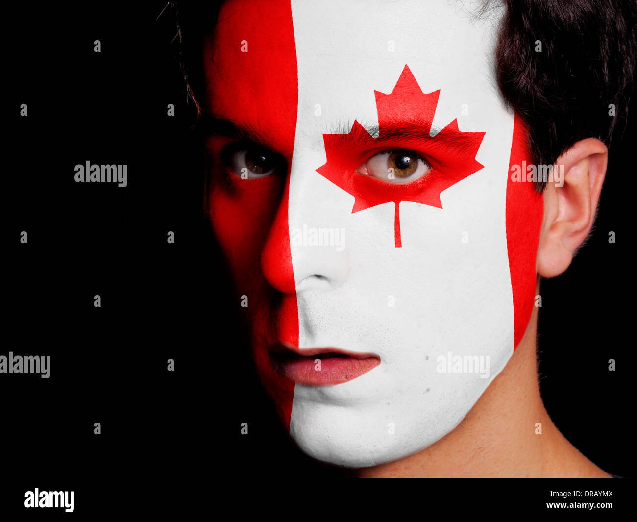 Flag of Canada Painted on a Face of a Young Man Stock Photo - Alamy