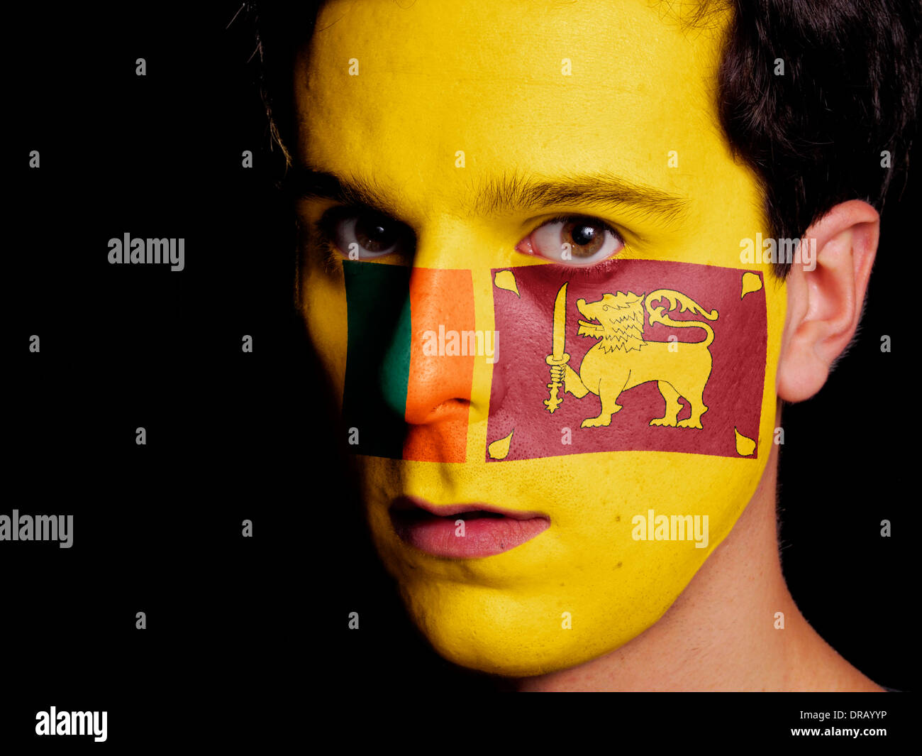 Flag of Sri Lanka Painted on a Face of a Young Man Stock Photo - Alamy