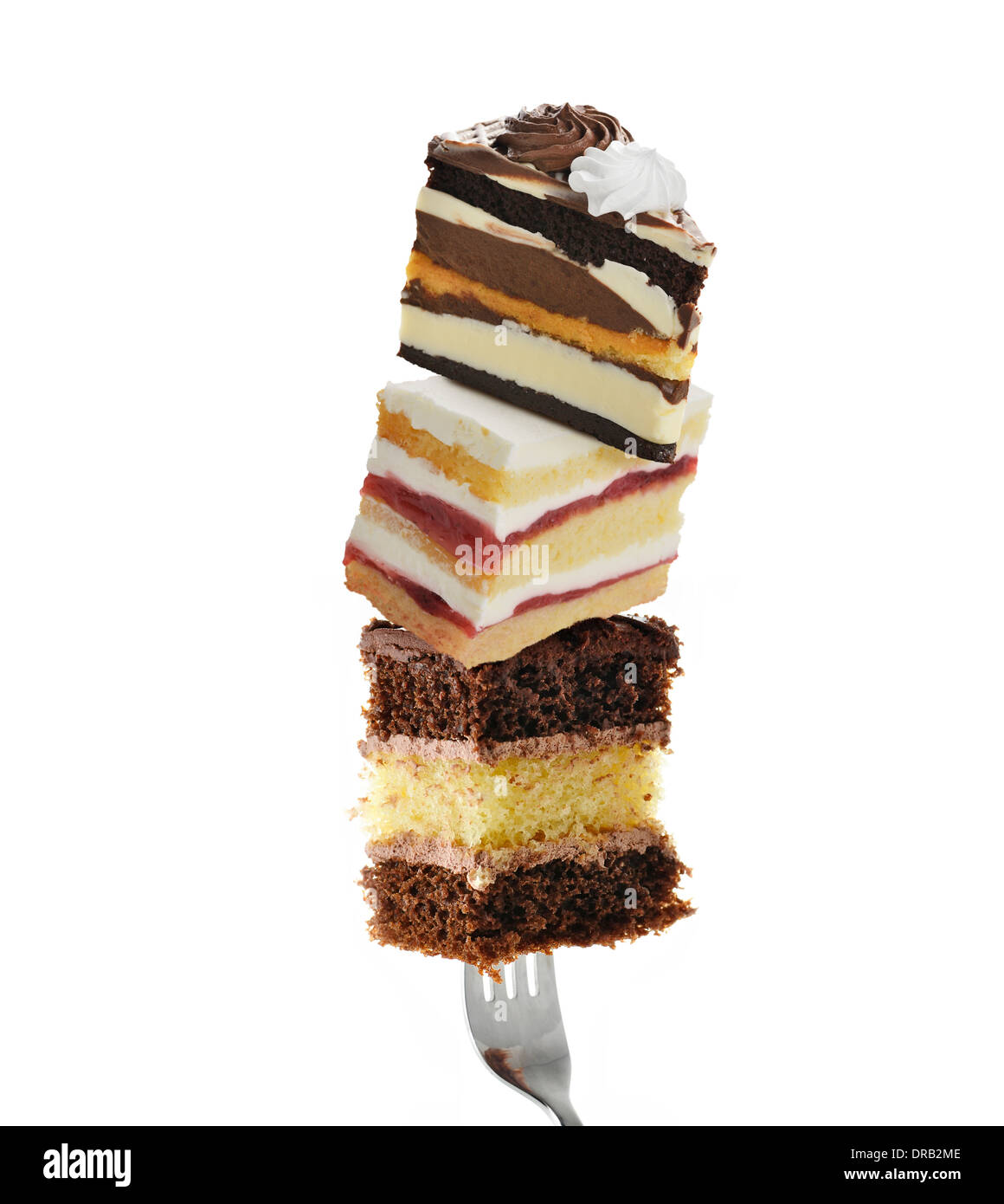 Stack Of Cake Slices On A Fork Stock Photo - Alamy