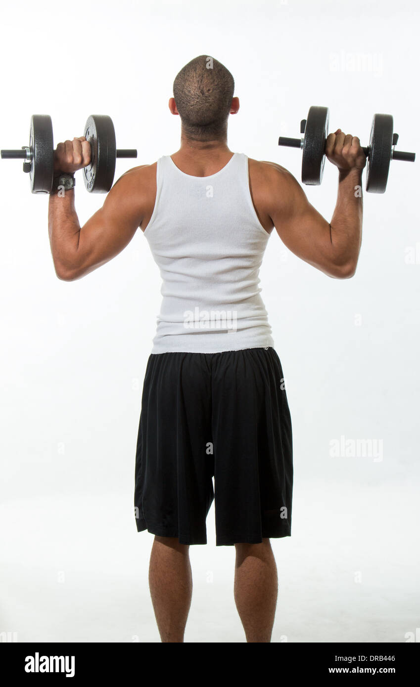 Physically fit hispanic man working out Stock Photo - Alamy