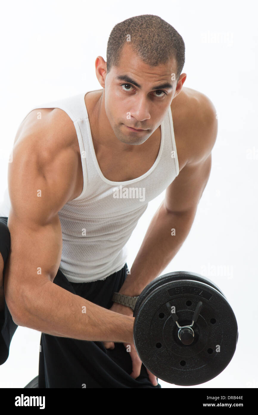 Physically fit hispanic man working out Stock Photo - Alamy