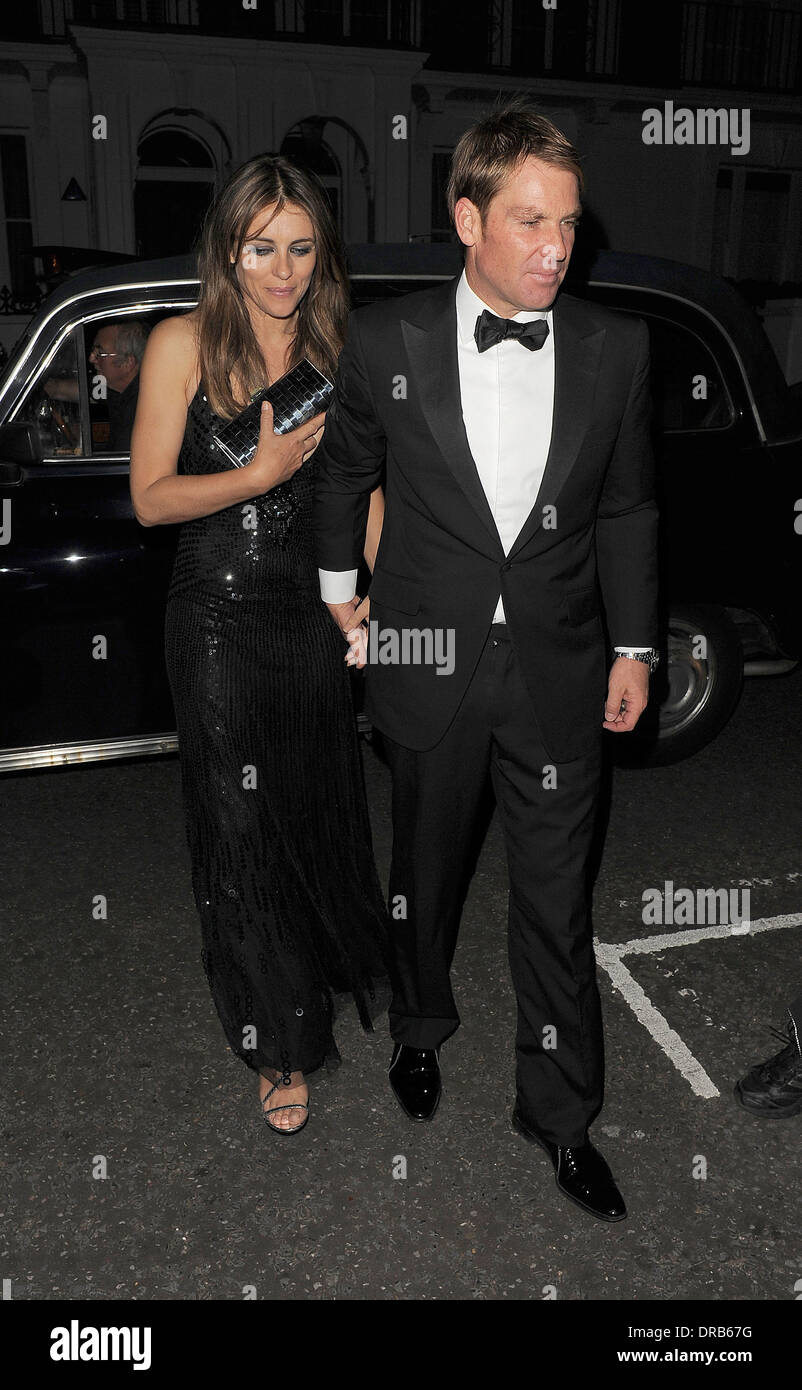 Shane Warne and Elizabeth Hurley return home, following a private party ...
