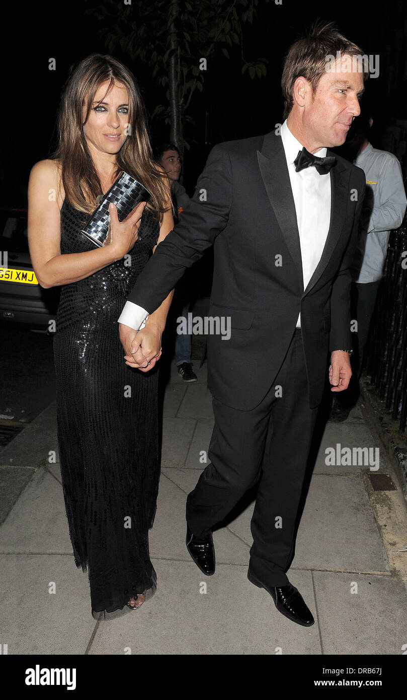 Shane Warne and Elizabeth Hurley return home, following a private party ...
