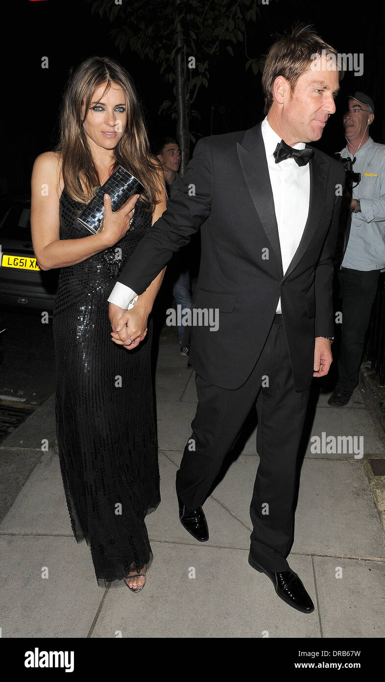 Shane Warne and Elizabeth Hurley return home, following a private party ...