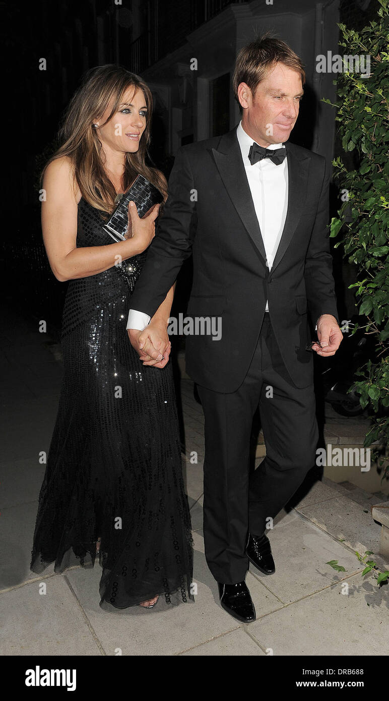 Shane Warne and Elizabeth Hurley return home, following a private party ...