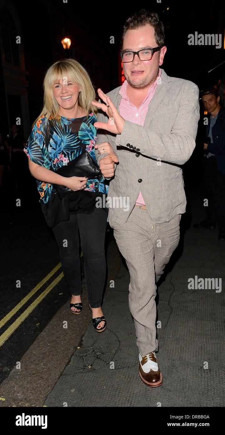 Alan Carr wearing Spatz shoes walks with former Coronation street star ...