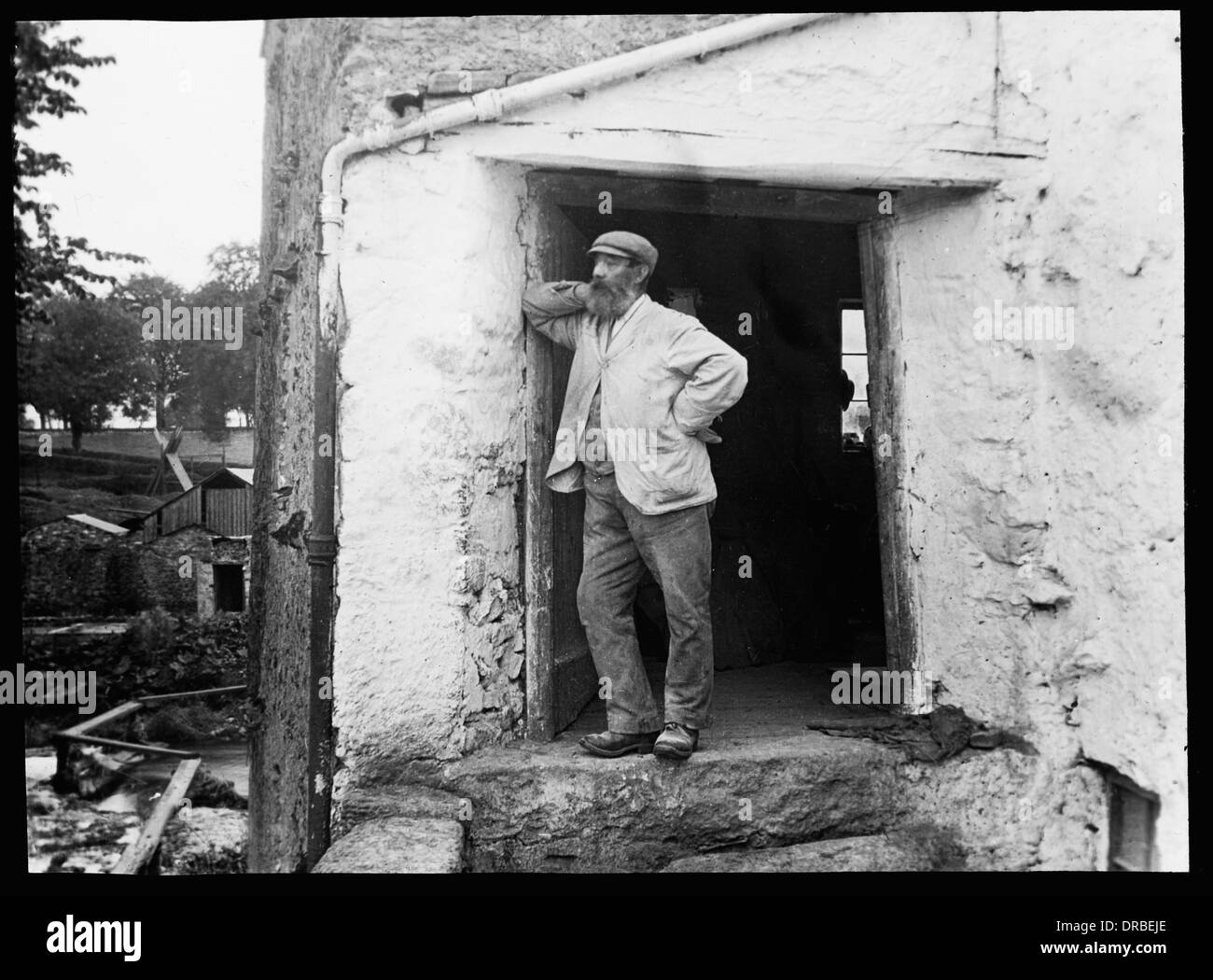 Portrait of William Newsham the miller at Beetham Mill 1905. Cumbria ...