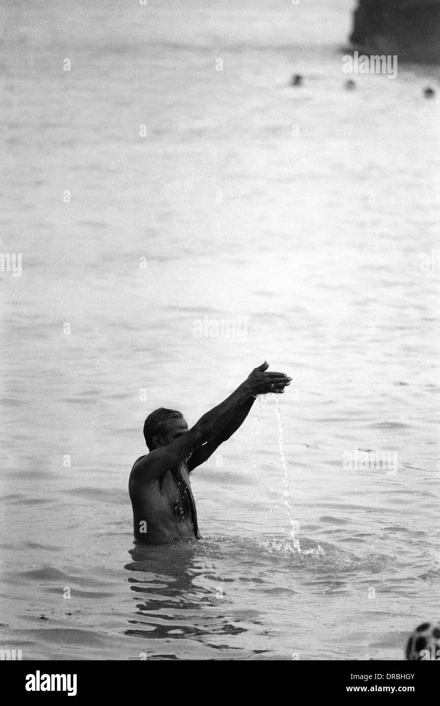 Indian man bathing Black and White Stock Photos & Images - Alamy