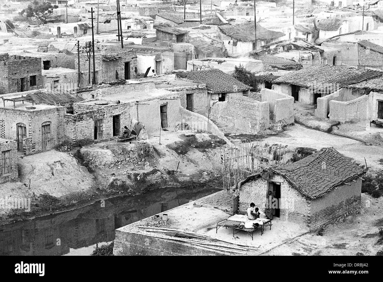 Family village house Black and White Stock Photos & Images - Alamy