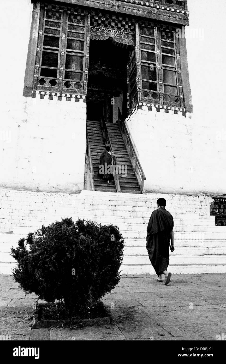 Monks climbing stairs in Buddhist Monastery, Thimphu, Bhutan, 1989 ...