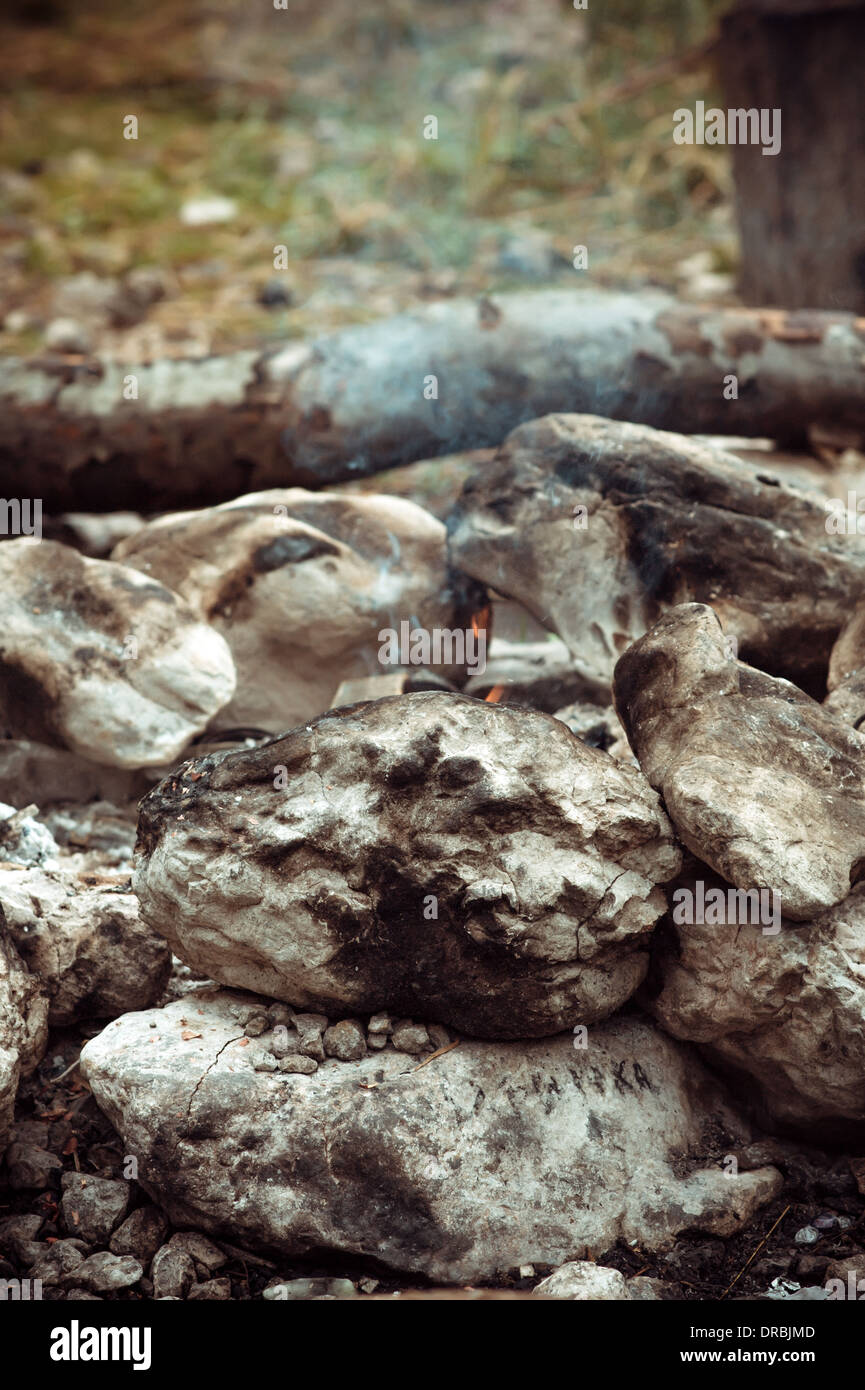 Smoke of Fire with burnt stones Outdoor natural moody background ...