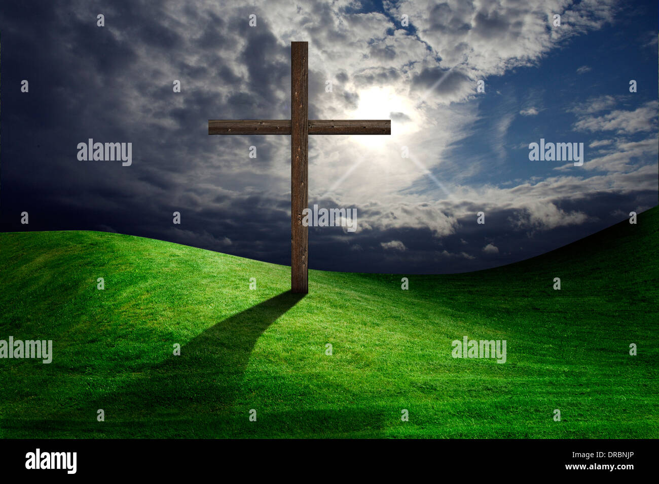 Christian cross of christ in field Stock Photo - Alamy