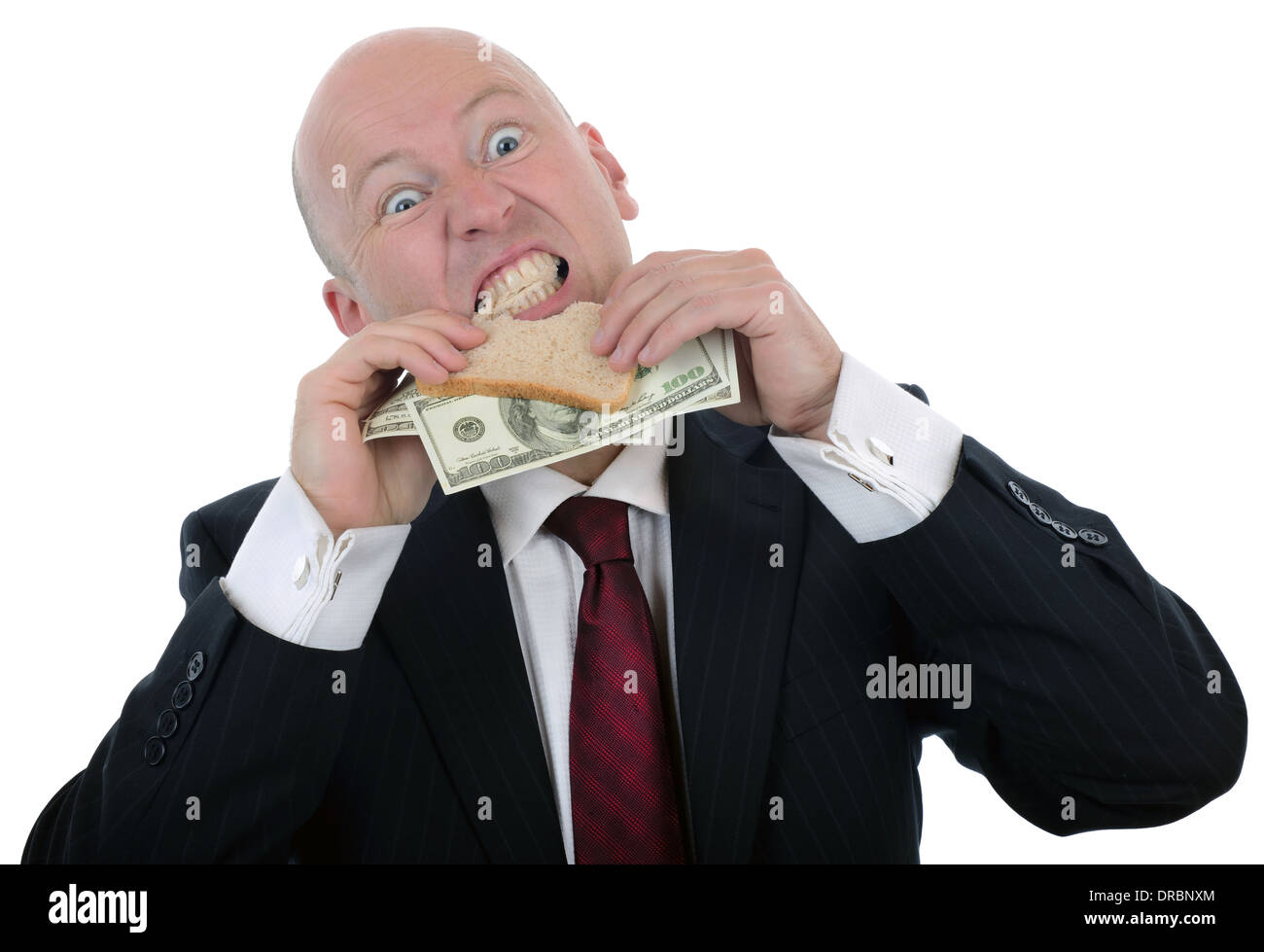 businessman eating a money sandwich isolate don a white background ...