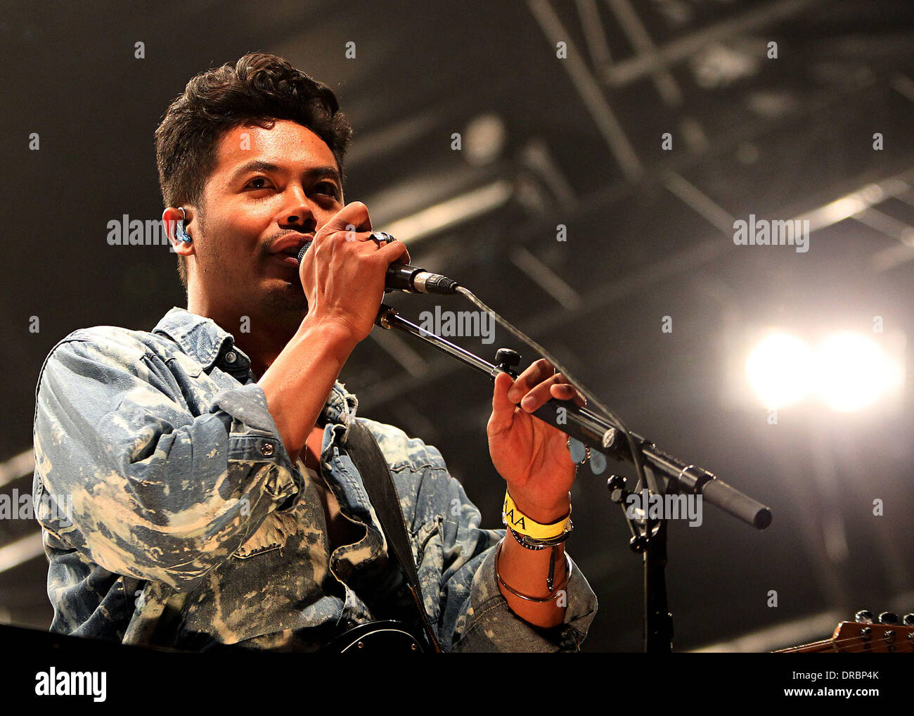 Lead singer Dougy Mandagi of Temper Trap performing on stage in the ...