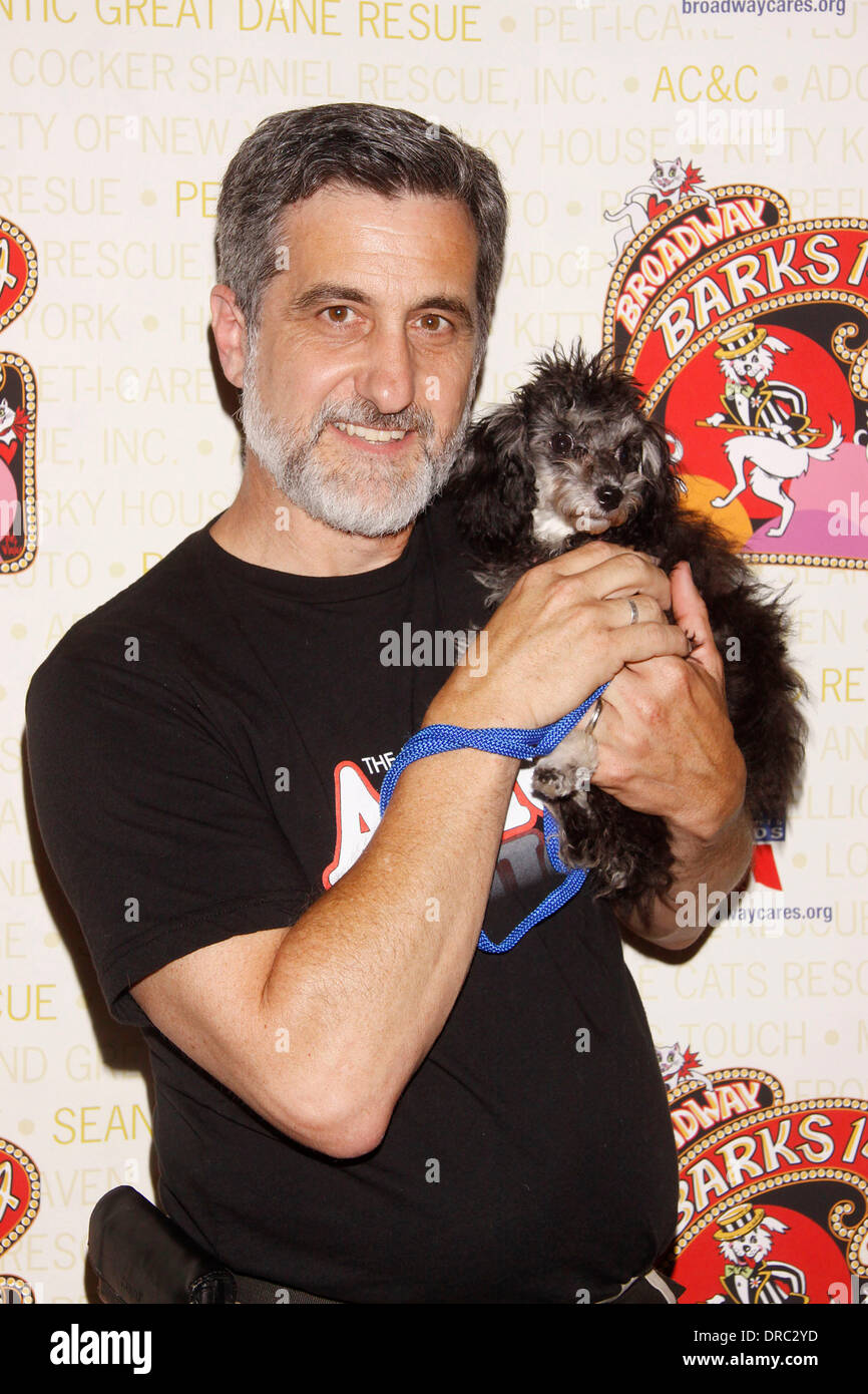 Bill Berloni holds Meghan, a dog up for adoption Broadway Barks: The ...
