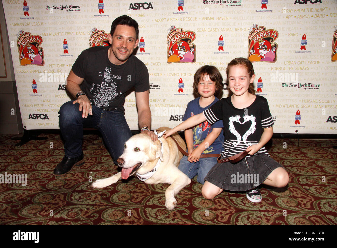 Steve Kazee, Garrison Sobo and Ripley Sobo with Blanche, a dog up for ...