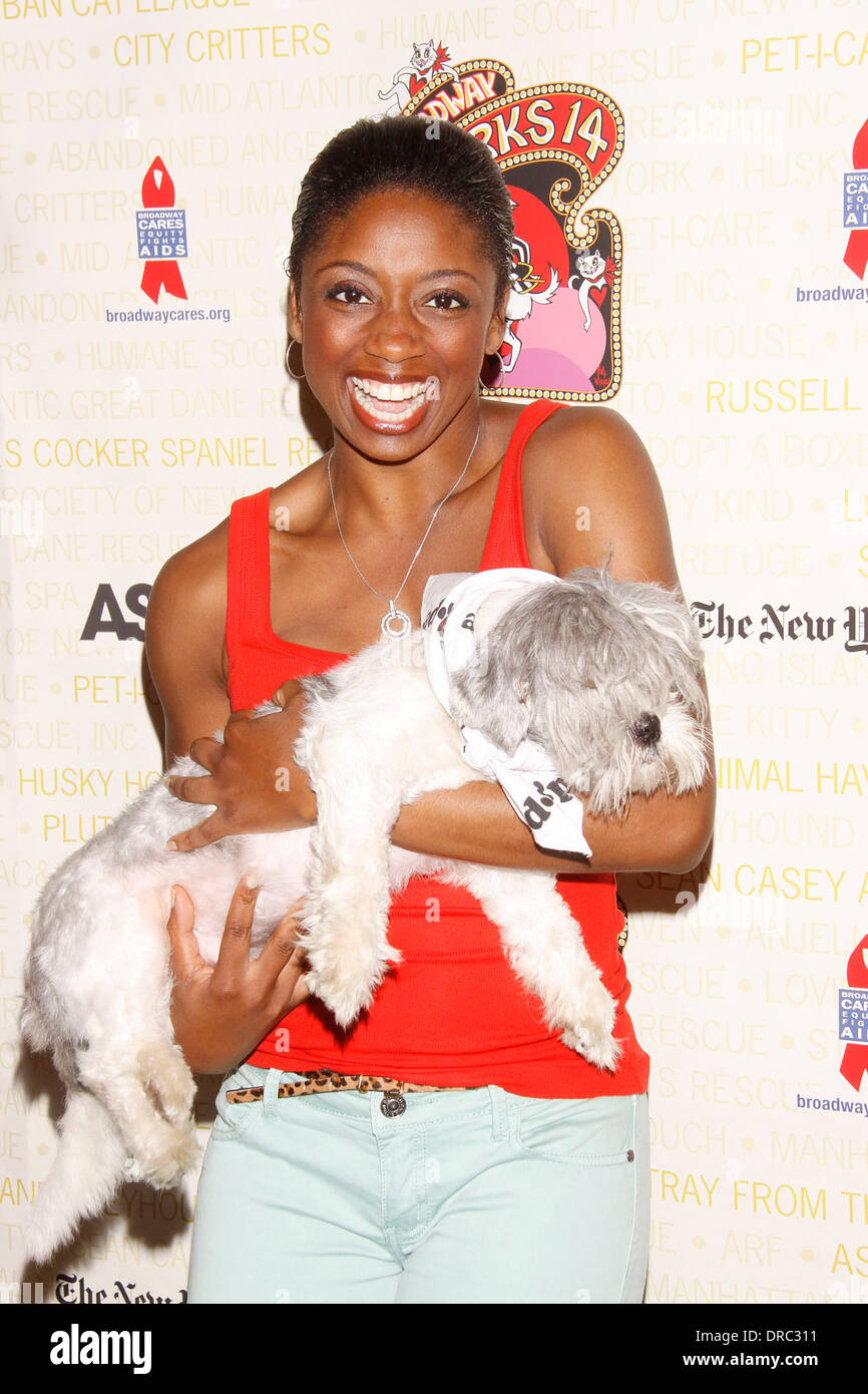 Montego Glover holds Pepsi, a dog up for adoption Broadway Barks: The ...