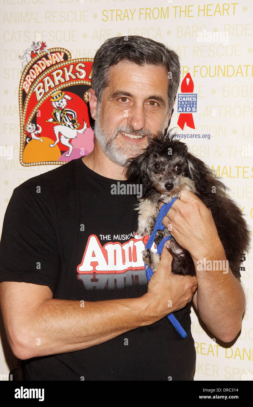 Bill Berloni holds Meghan, a dog up for adoption Broadway Barks: The ...