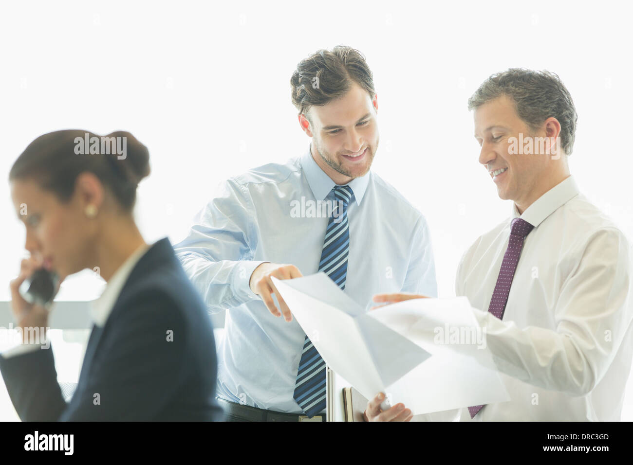 Woman looking businessman talking hi-res stock photography and images ...
