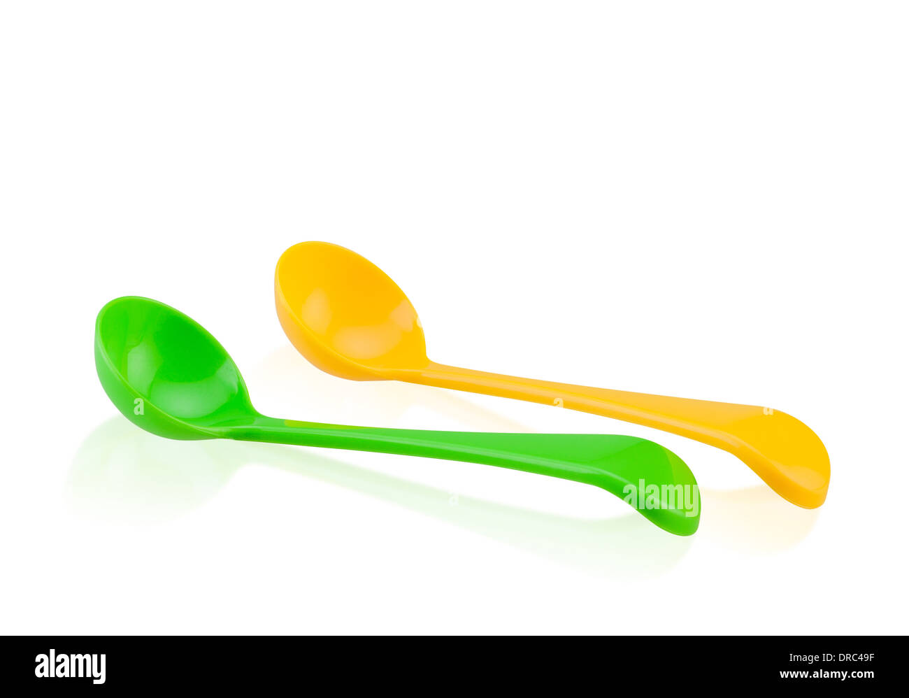 Colorful toy spoons isolated on white background Stock Photo - Alamy
