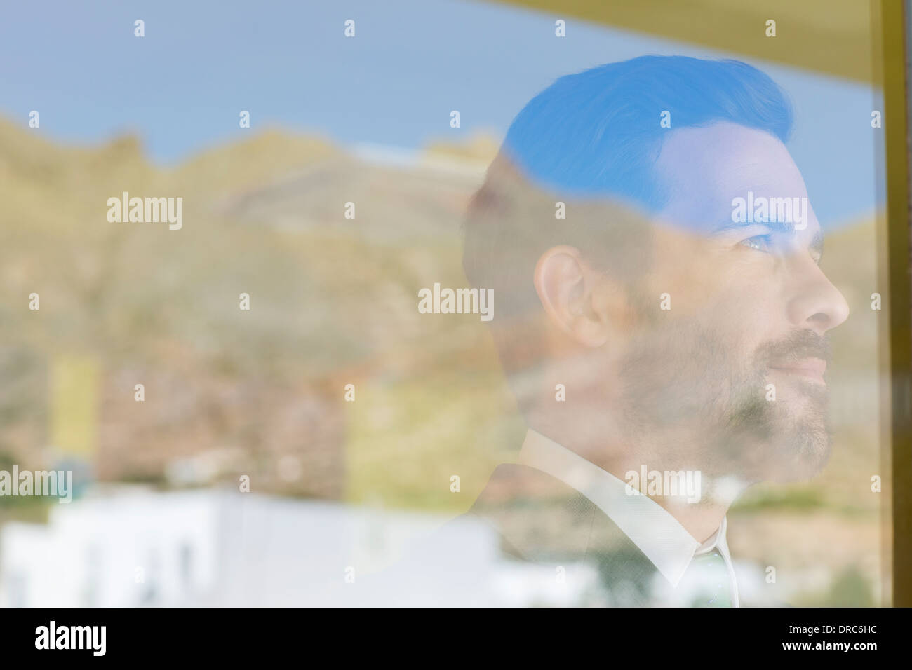 Man looking watching window hi-res stock photography and images - Alamy