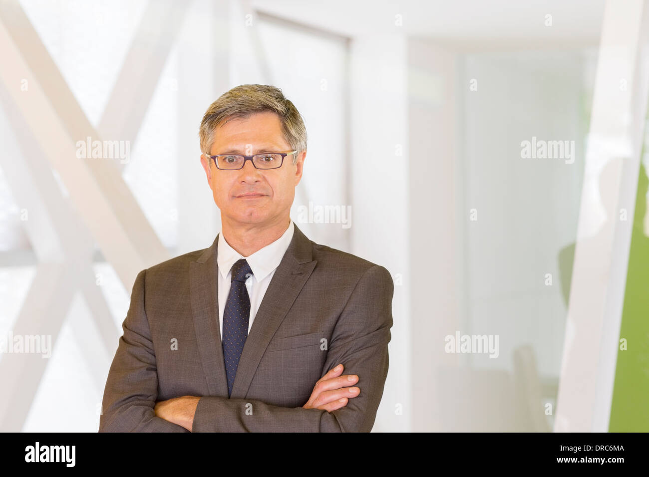 Business man standing office hi-res stock photography and images - Alamy