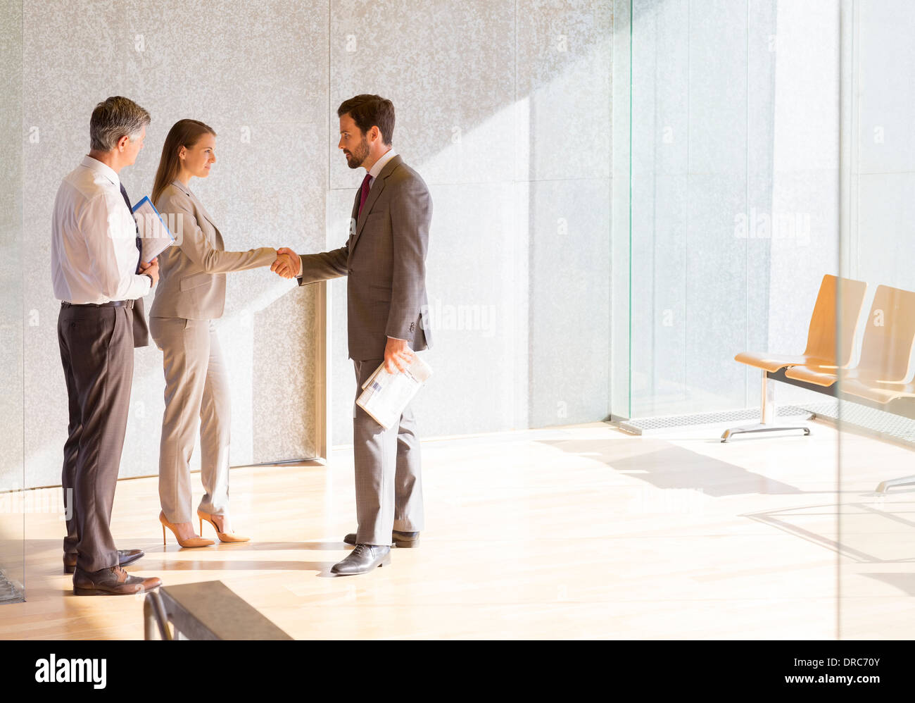 Business woman shaking hands office hi-res stock photography and images ...